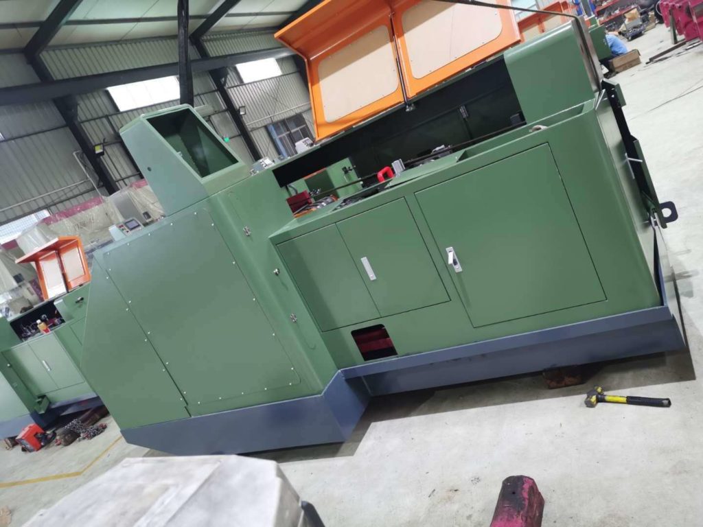 Three stations deep hole semi tubular rivet making machine - Bolt Nut ...